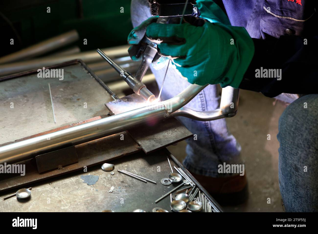 Welding of steel spade handle Stock Photo - Alamy