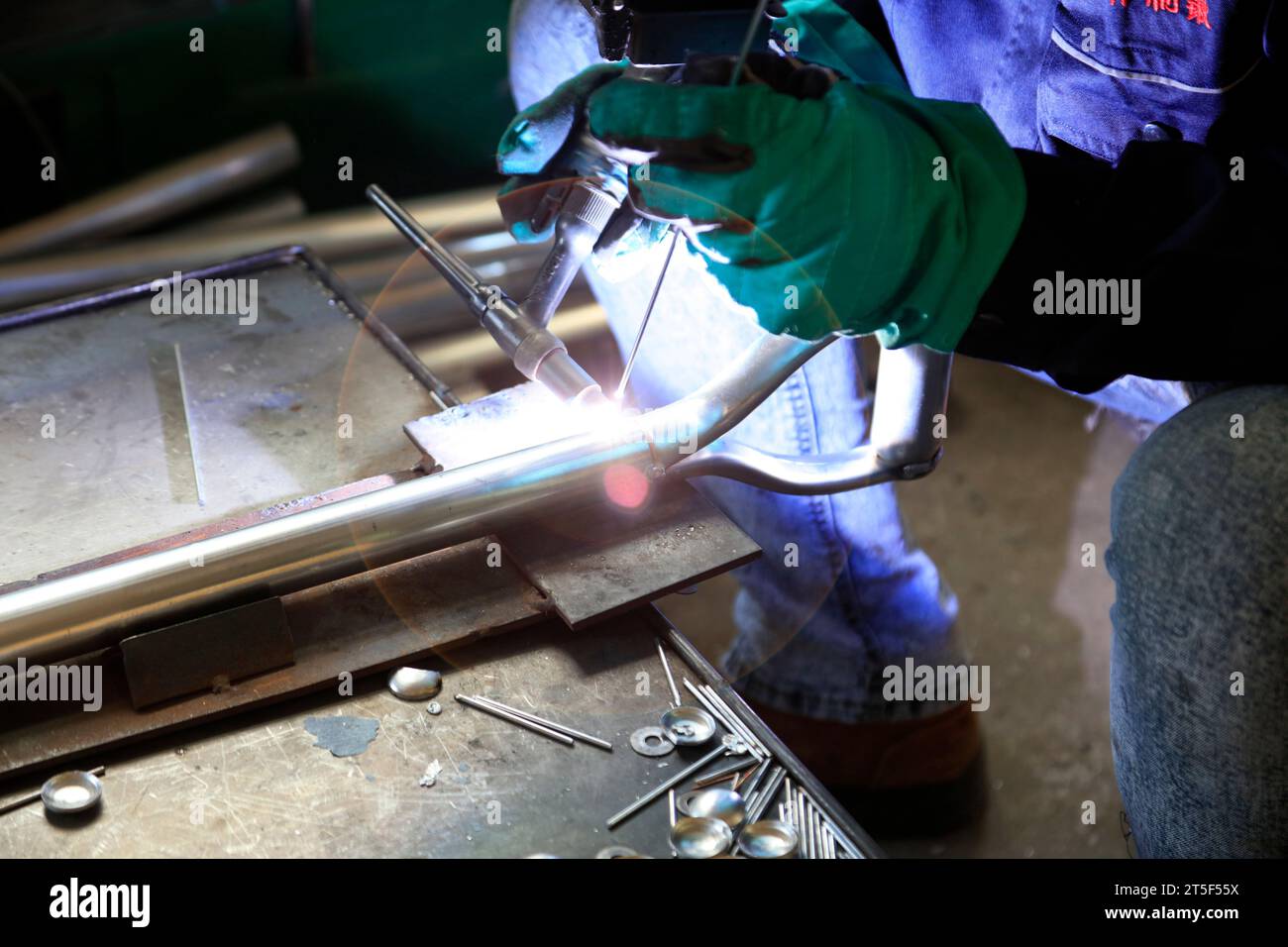 Welding of steel spade handle Stock Photo - Alamy