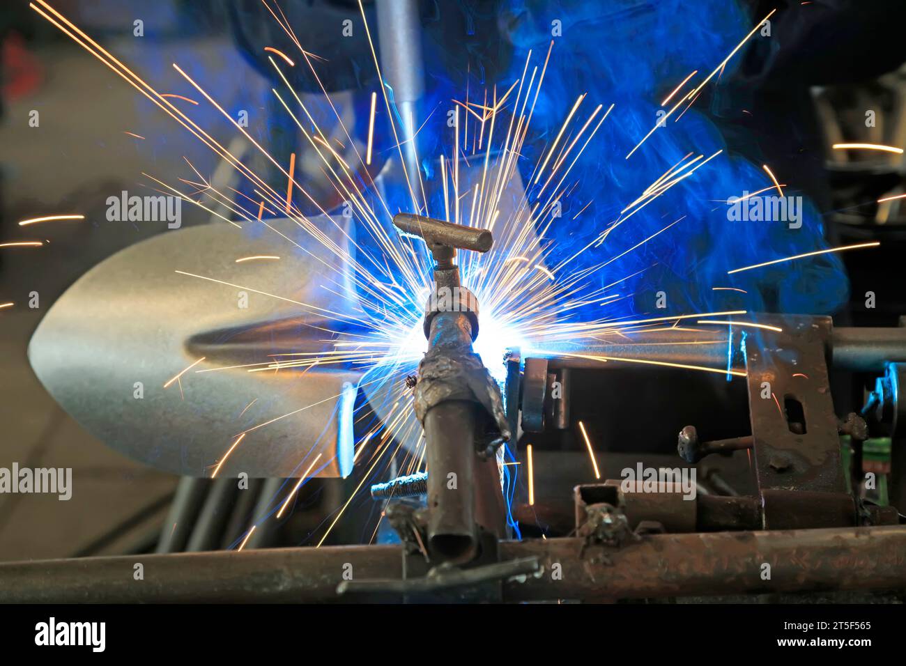 Automatic welding production line for steel spade Stock Photo - Alamy