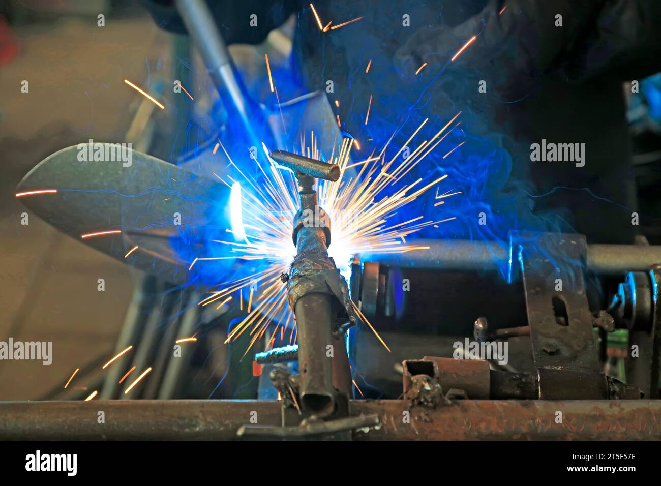 Automatic welding production line for steel spade Stock Photo - Alamy
