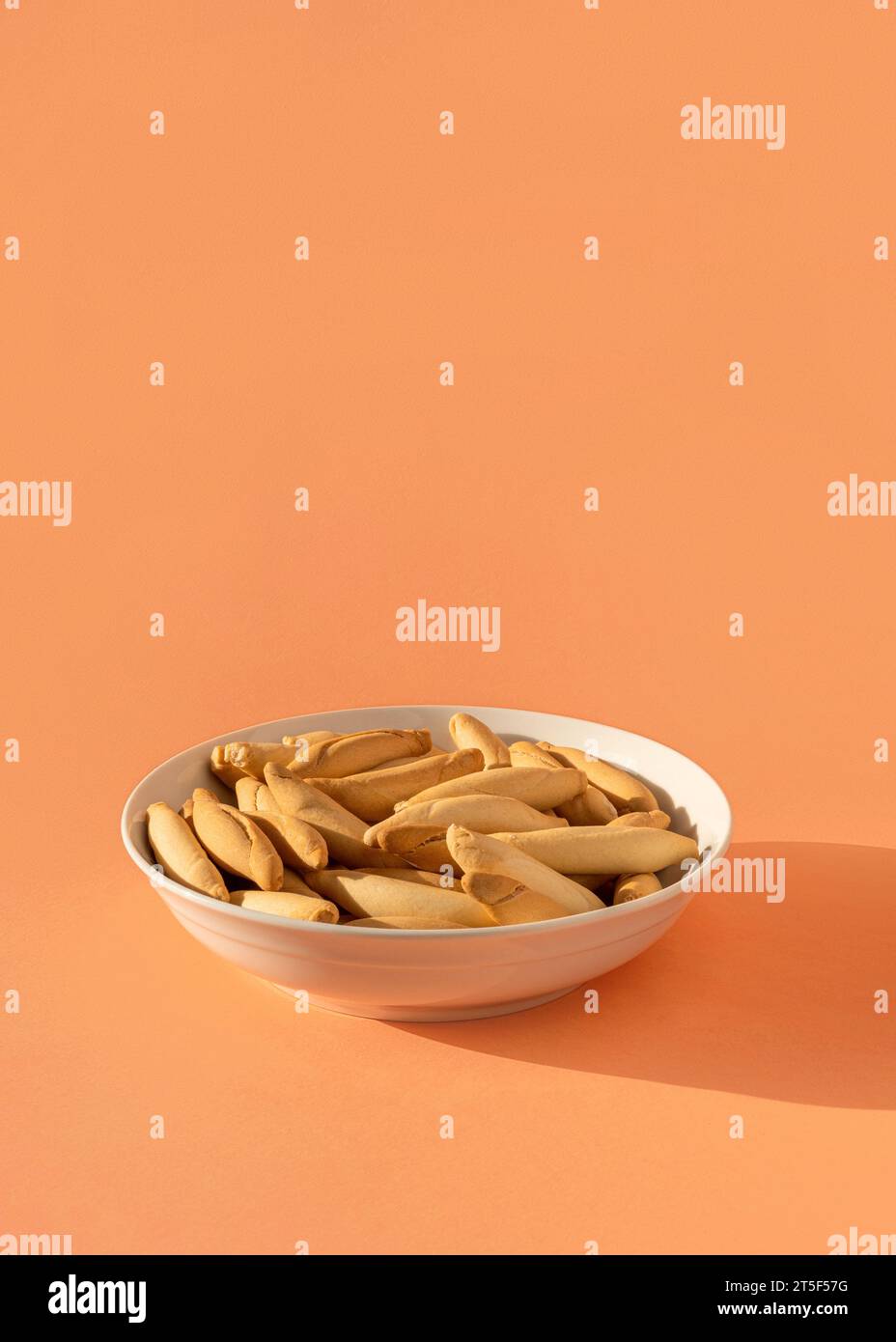 Spanish mini picos bread sticks in bowl Stock Photo - Alamy