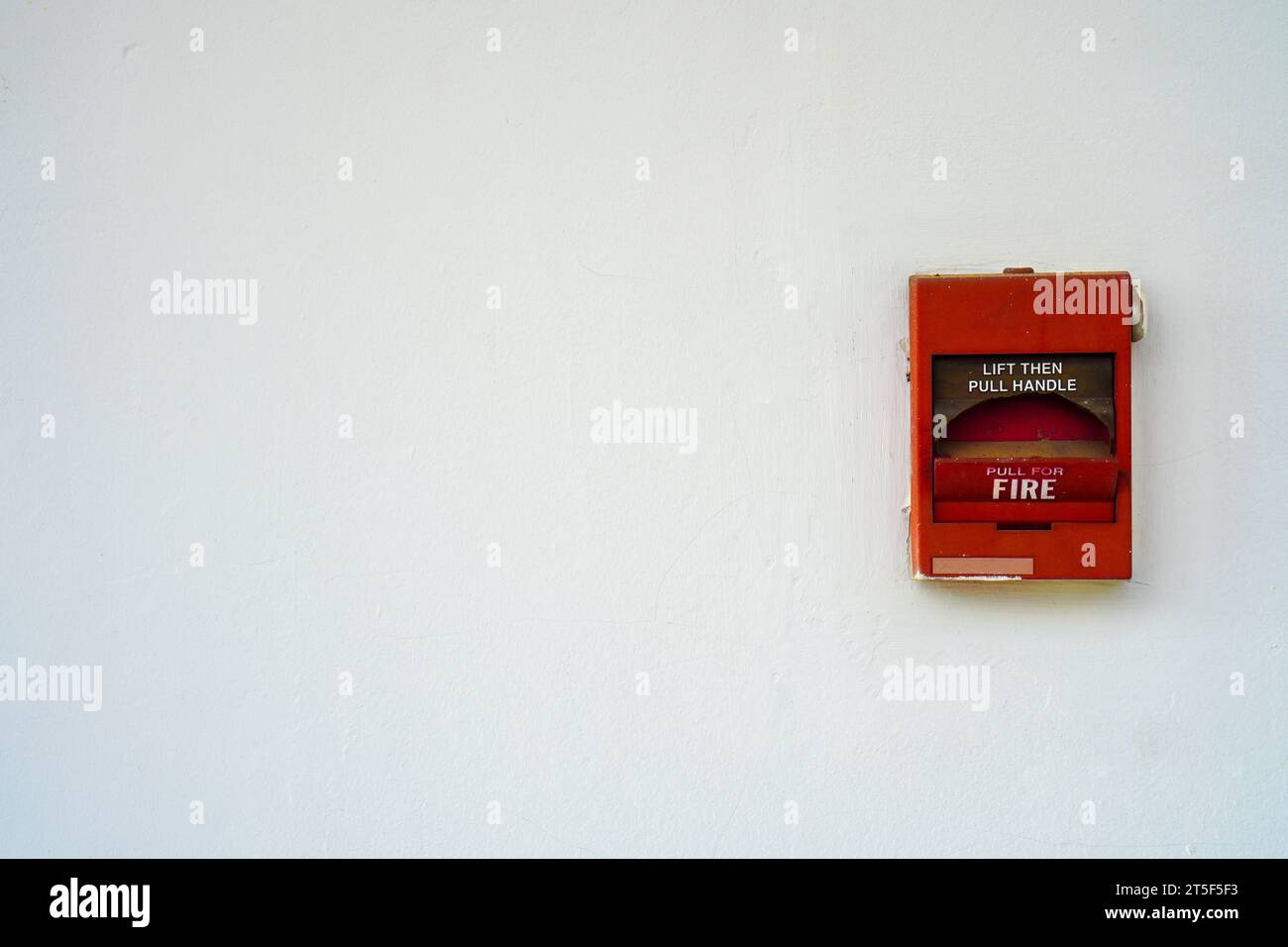 The old fire alarm is still attached to the white wall. Fire Alarm Fail ...
