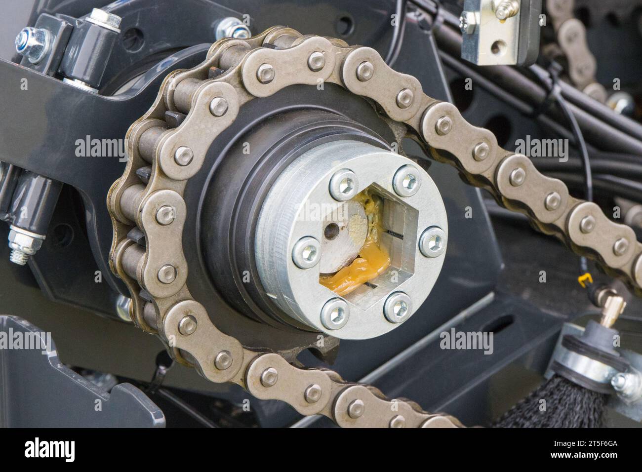 Metal chain and gear as detail and part of agricultural and industrial ...