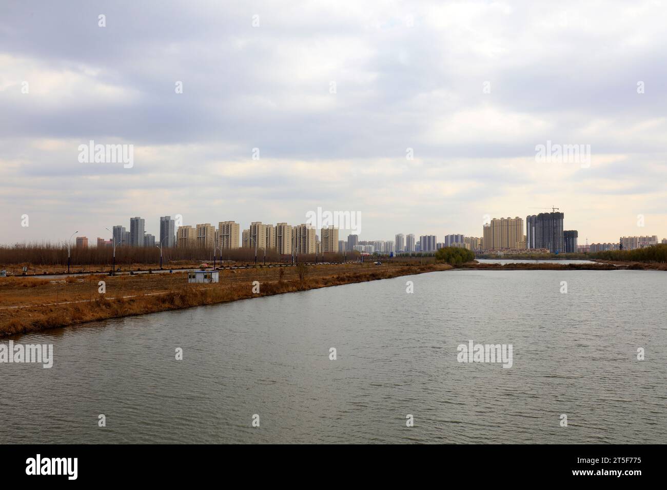 Waterfront city building scenery Stock Photo - Alamy