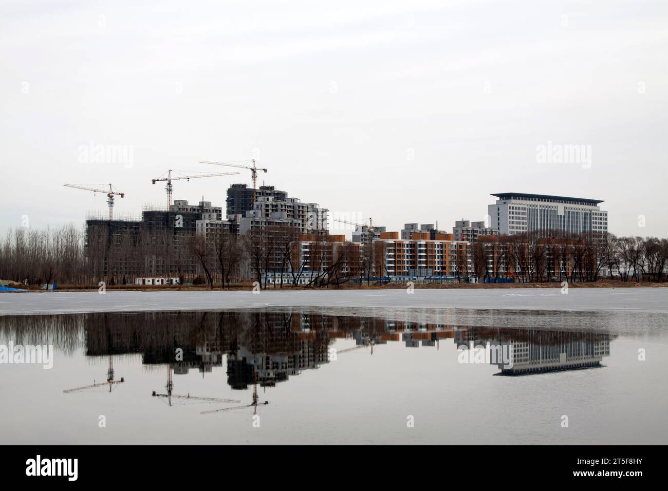 unfinished building at the side of river Stock Photo - Alamy