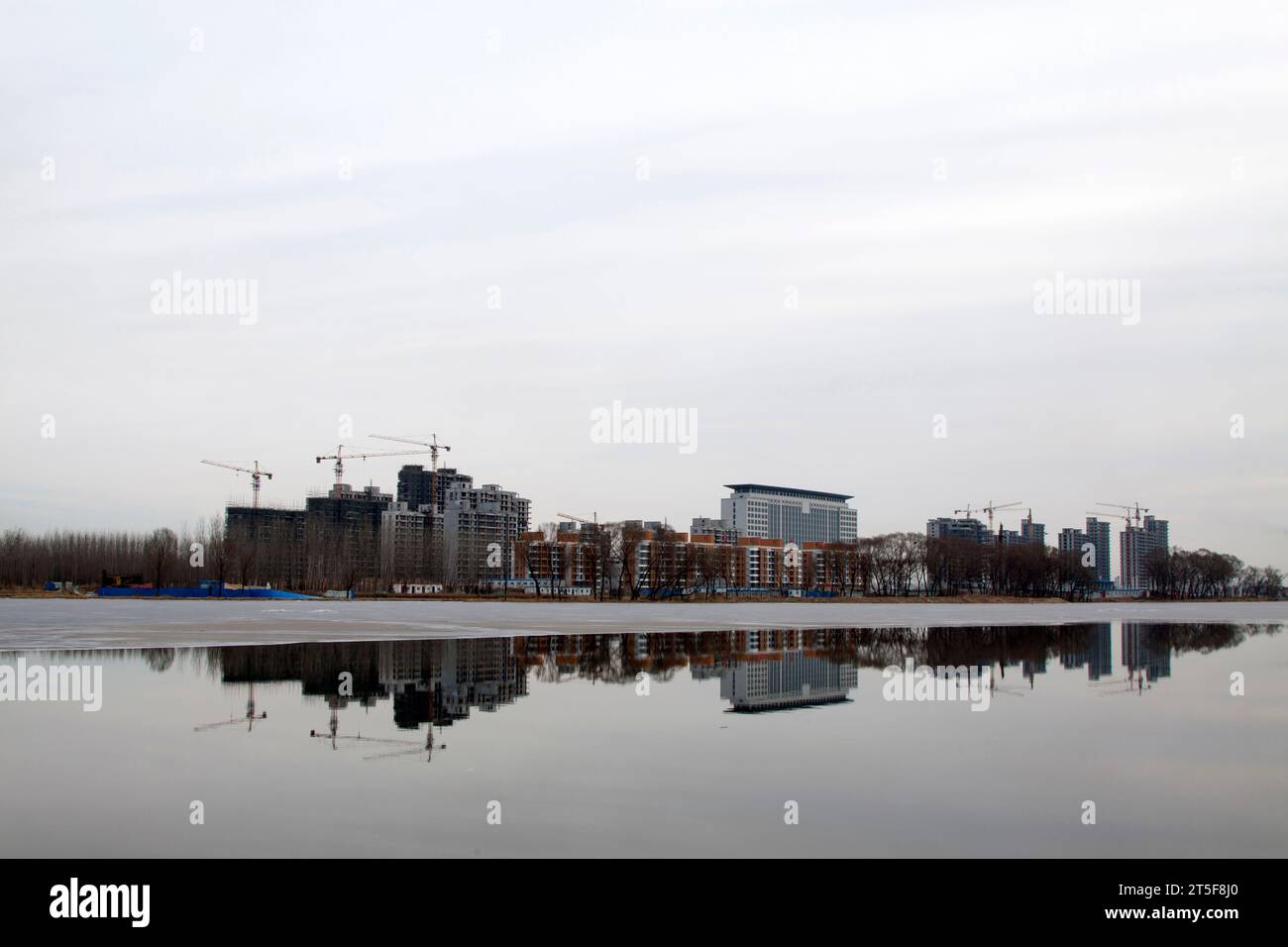 unfinished building at the side of river Stock Photo - Alamy