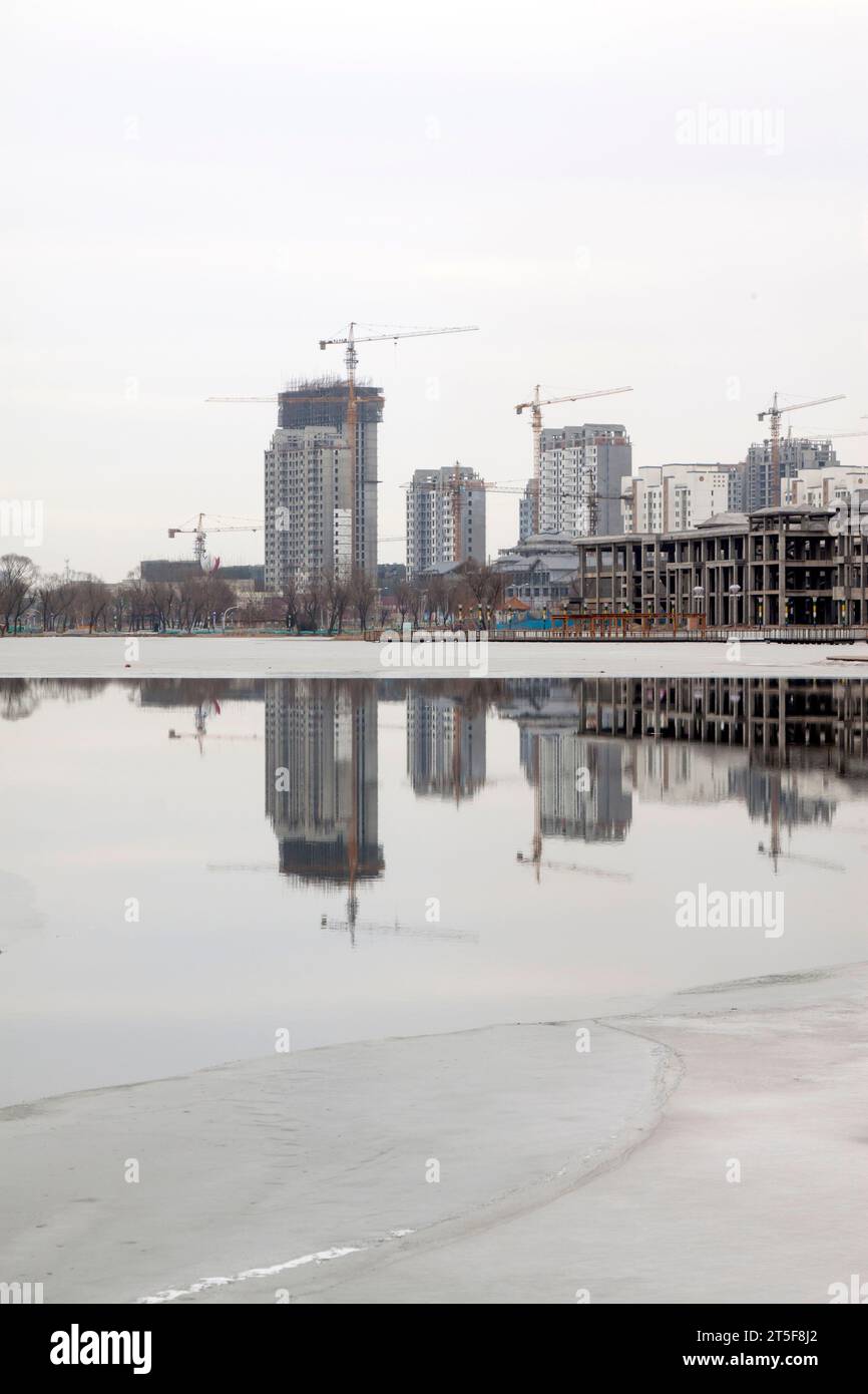 unfinished building at the side of river Stock Photo - Alamy