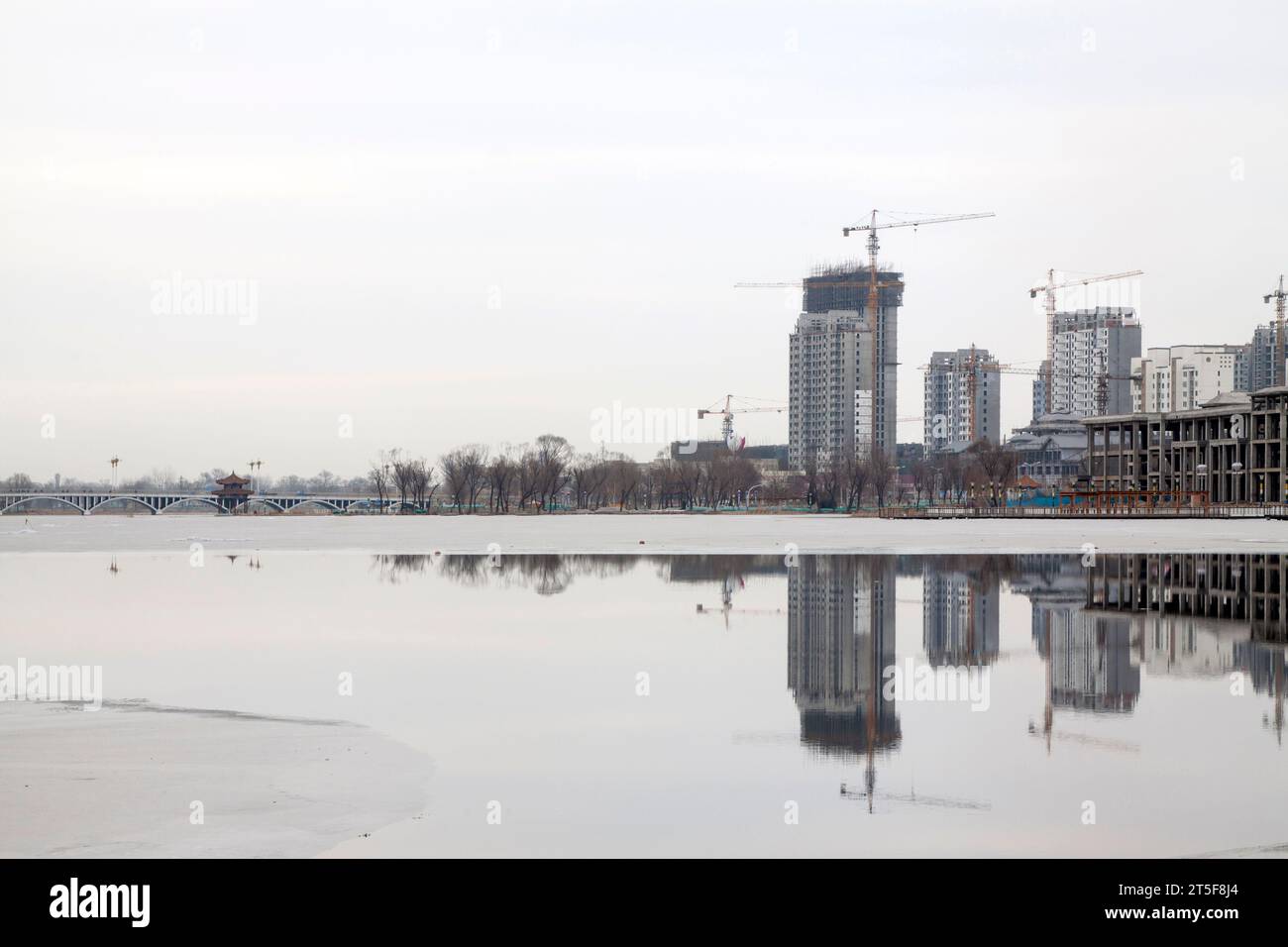 unfinished building at the side of river Stock Photo - Alamy