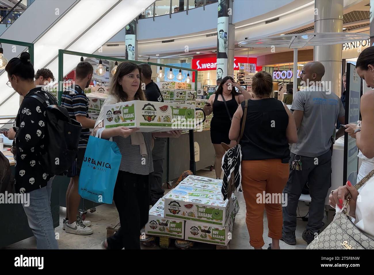 People purchase fresh produce in an effort to support Israeli farmers ...