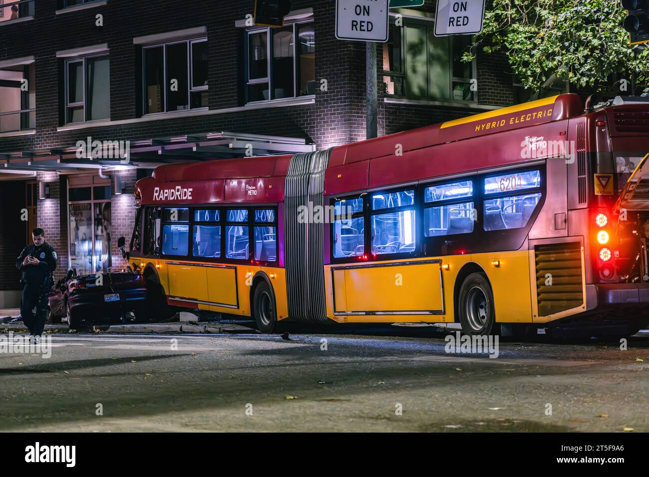 A red sedan southbound on 5th Avenue when it collided with a bus ...