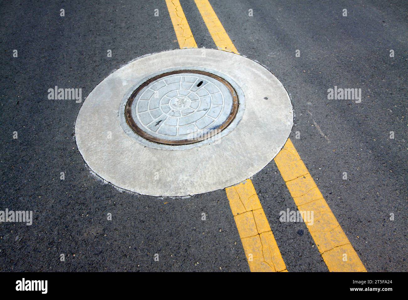 yellow double solid line on the road Stock Photo - Alamy