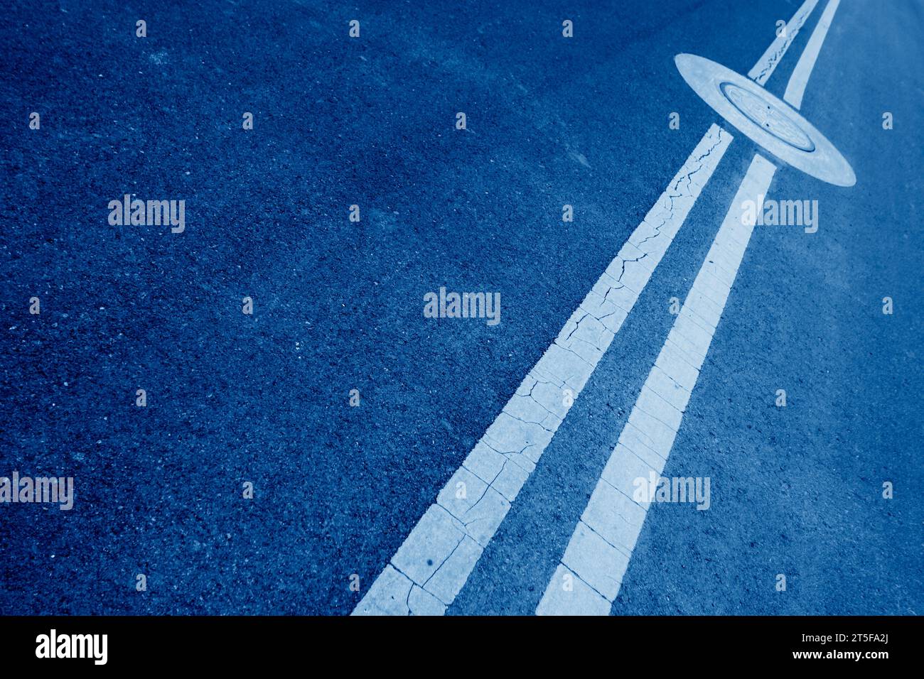 yellow double solid line on the road Stock Photo - Alamy