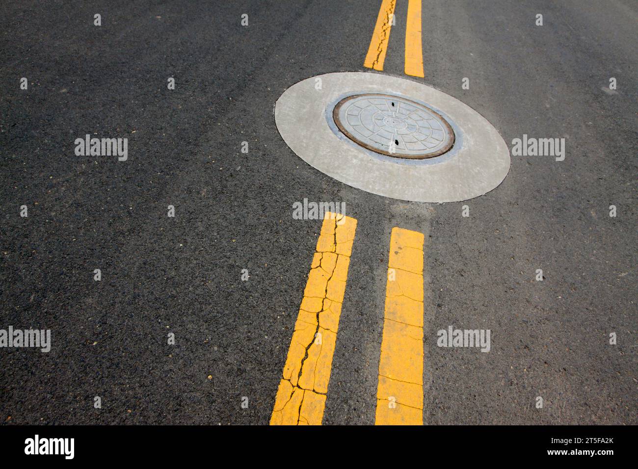 yellow double solid line on the road Stock Photo - Alamy