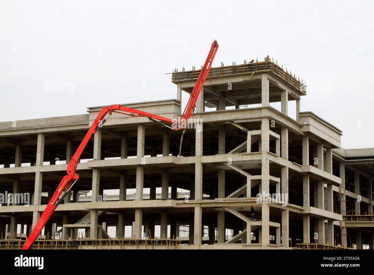 unfinished high rise building and concrete placing installation Stock ...