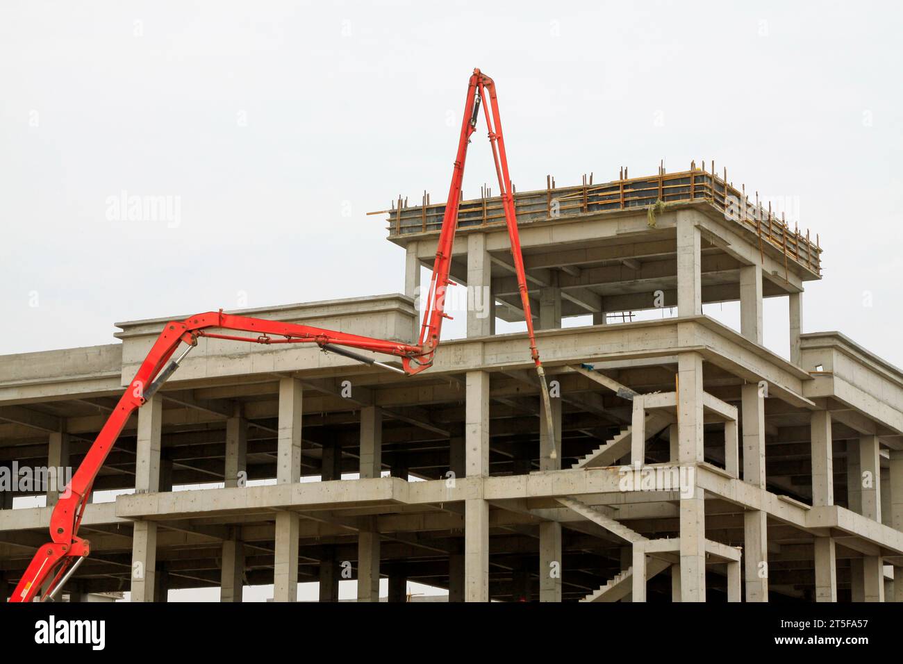 unfinished high rise building and concrete placing installation Stock ...