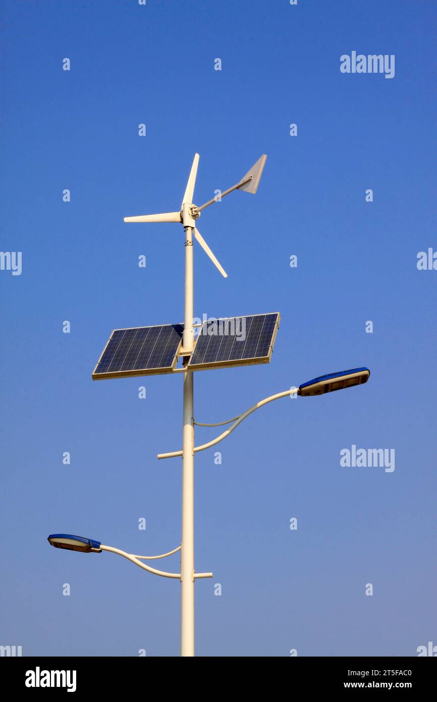 solar and wind power street lights in the sky Stock Photo - Alamy
