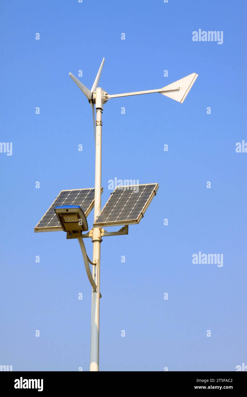 solar and wind power street lights in the sky Stock Photo - Alamy