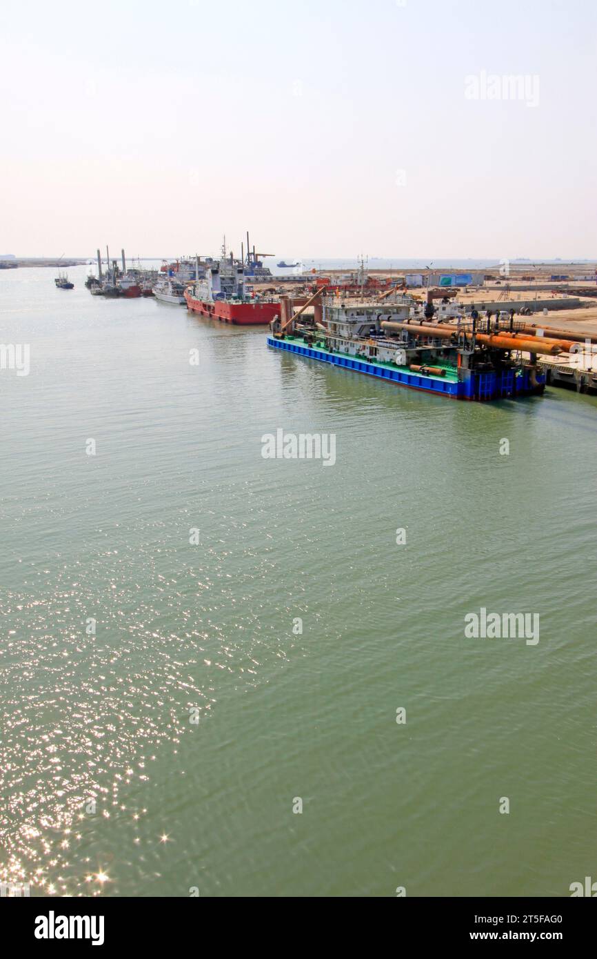 busy shipyard dock and docked ships, north china Stock Photo - Alamy