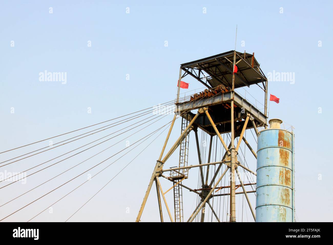 drilling derrick in a iron mine in the blue sky Stock Photo - Alamy
