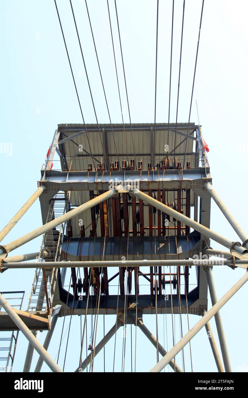 drilling derrick in a iron mine in the blue sky Stock Photo - Alamy