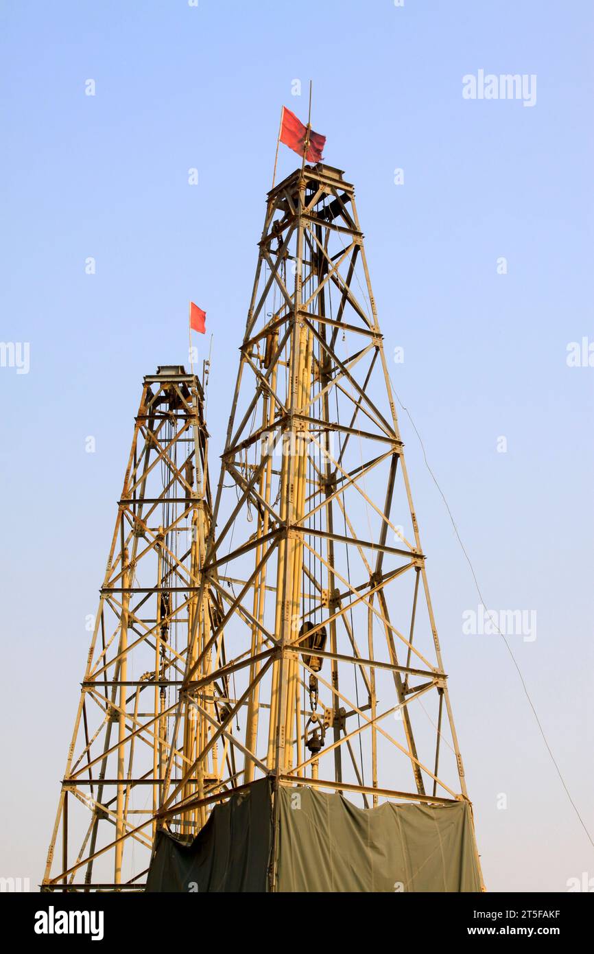 drilling derrick in a iron mine in the blue sky Stock Photo - Alamy