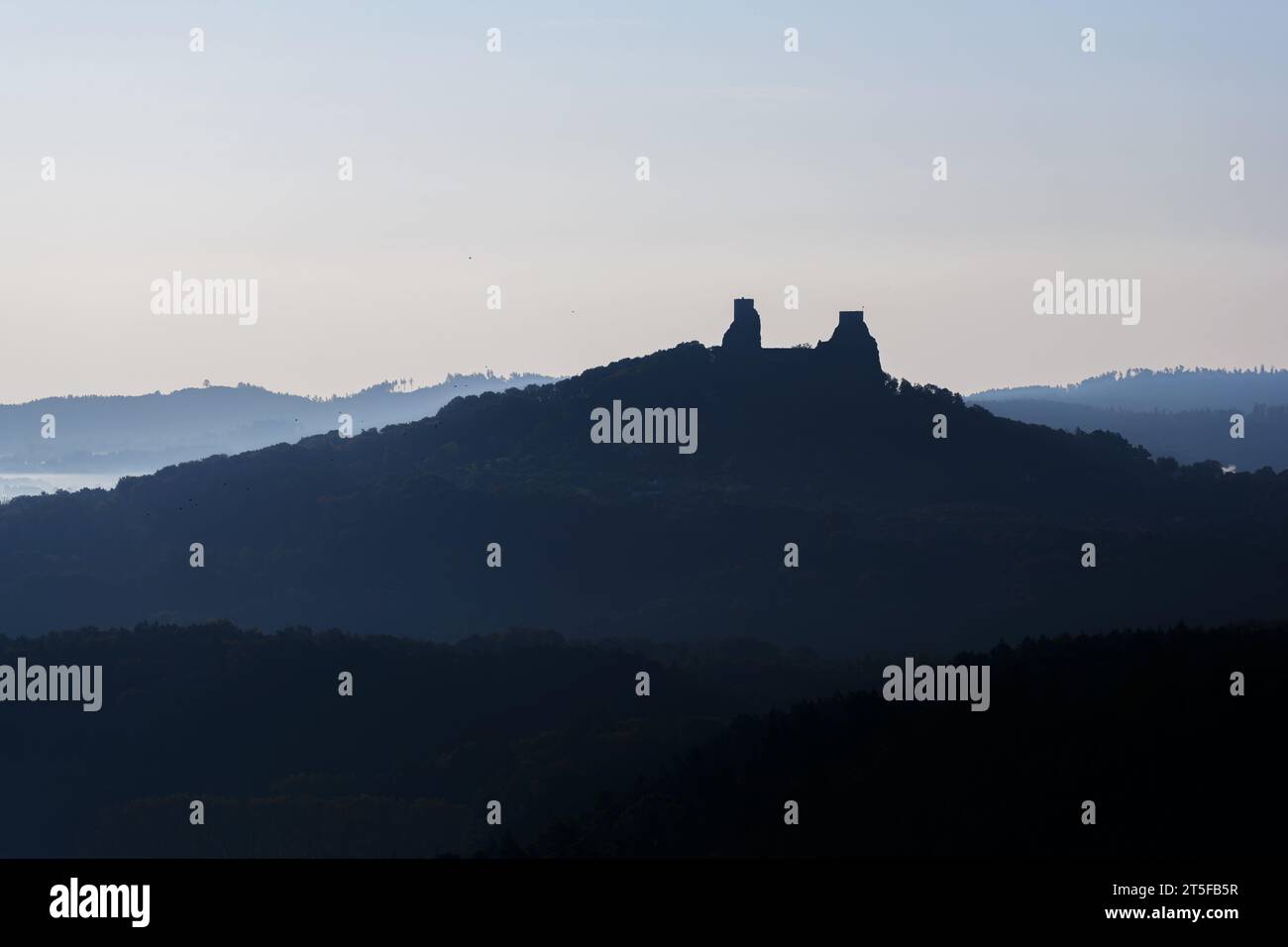Aerial view of ancient ruined Trosky Castle high on summits of two ...