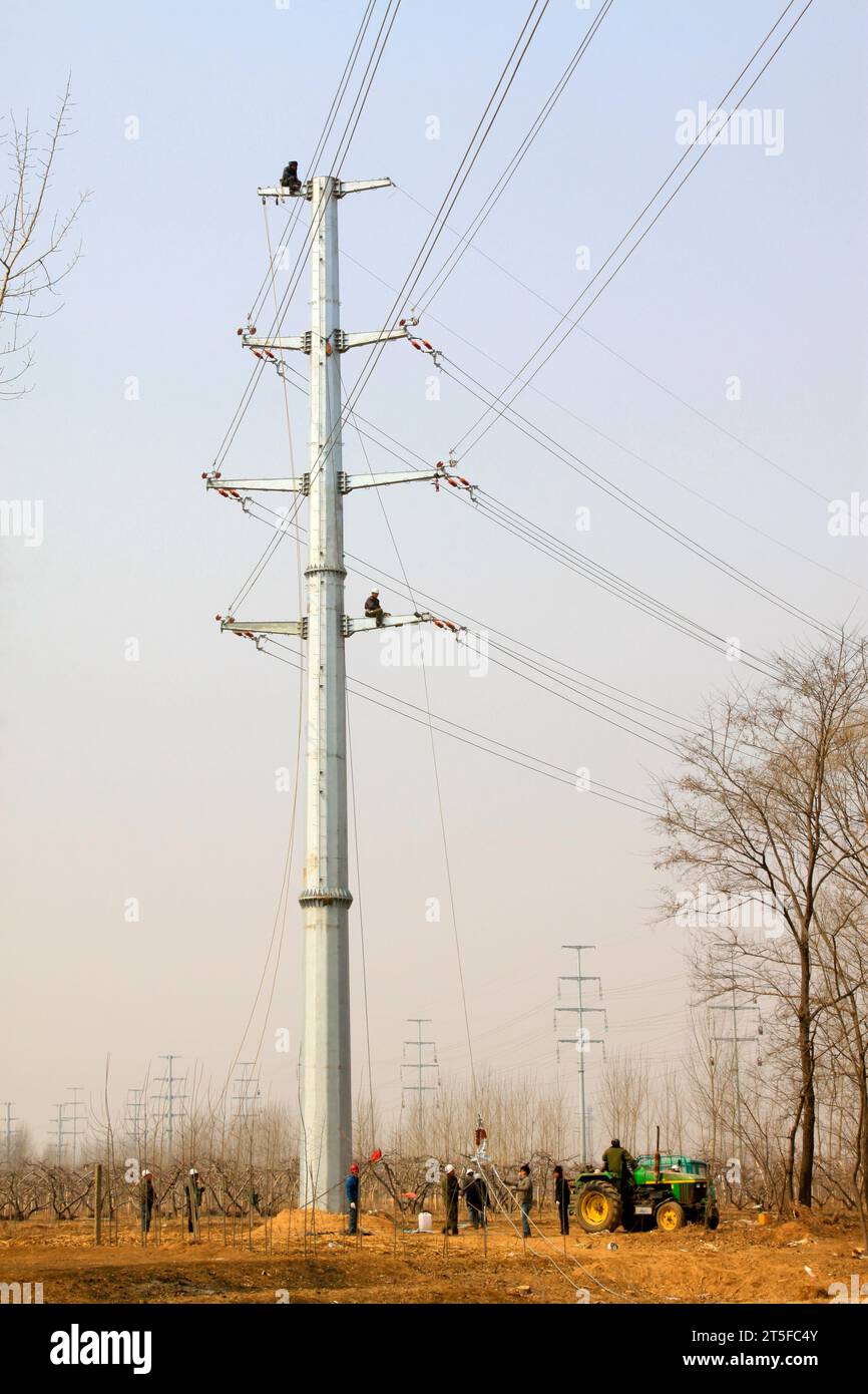 high voltage electric power steel tube tower under the blue sky Stock ...