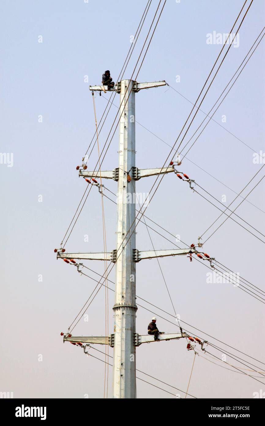 high voltage electric power steel tube tower under the blue sky Stock ...