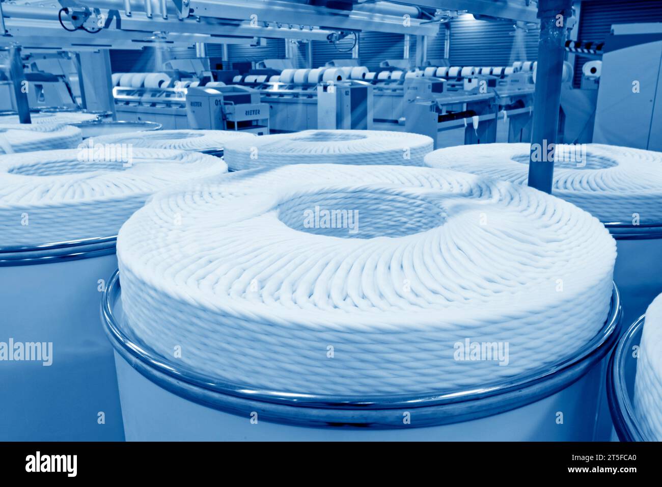 cotton group on a spinning production line in a factory Stock Photo - Alamy