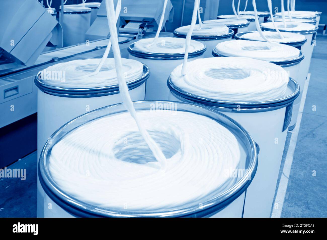 cotton group on a spinning production line in a factory Stock Photo - Alamy
