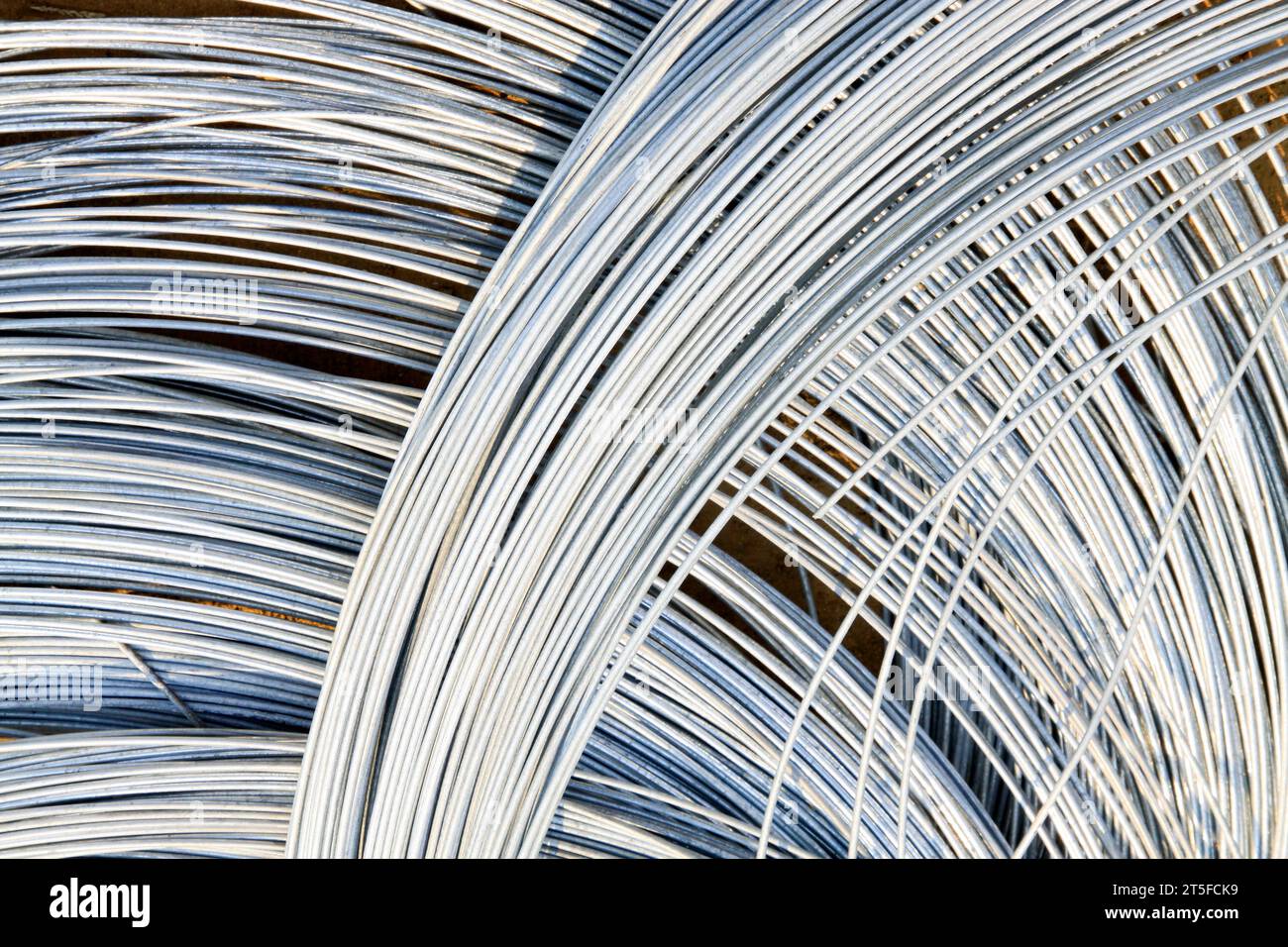galvanized iron wire on the ground, closeup of photo Stock Photo - Alamy