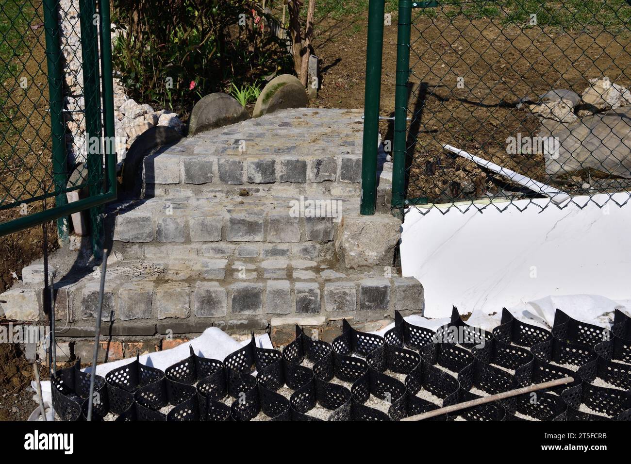 Ecological build of the car parking using crushed stone and plastic ...