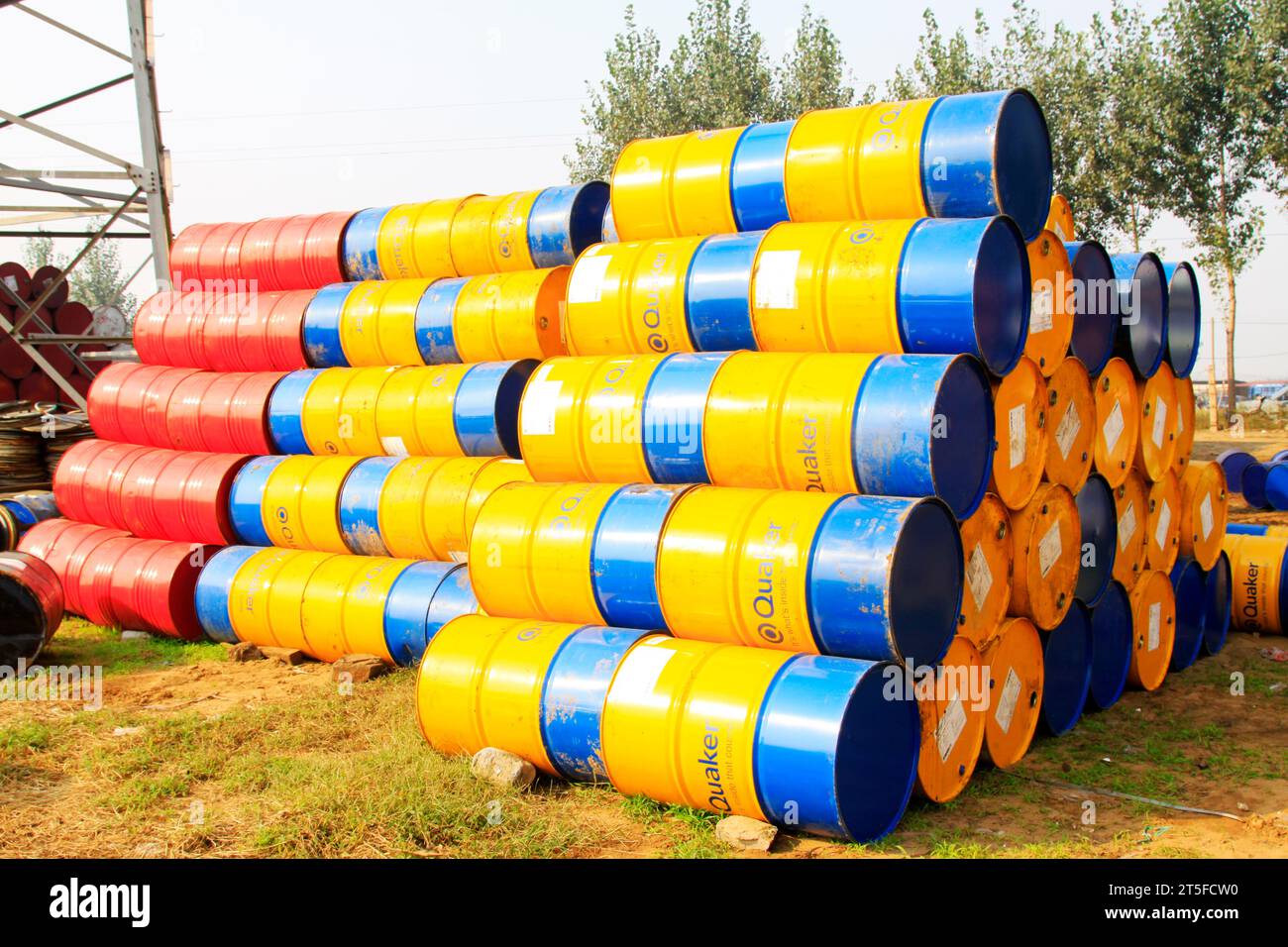 oil drums stacked together in a yard, north china Stock Photo - Alamy
