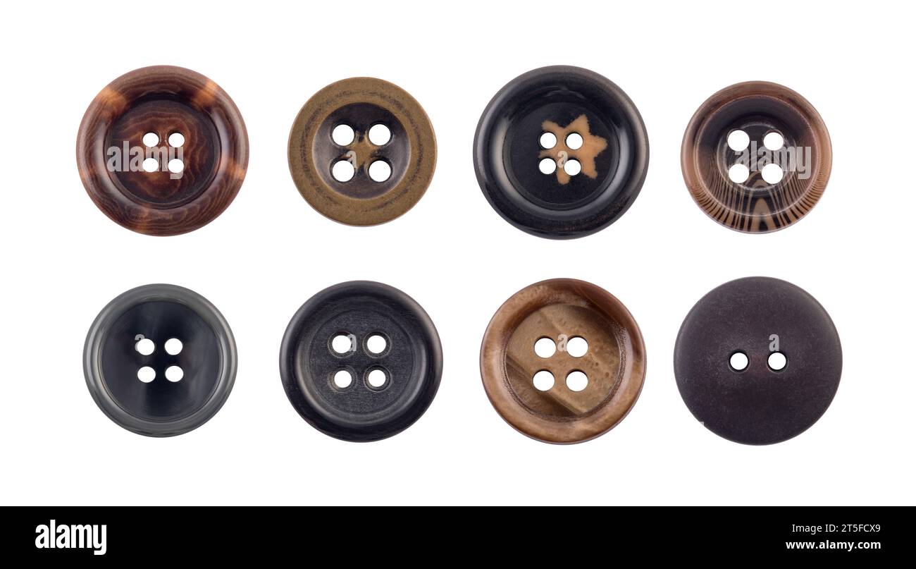 Group of various sewing clothing buttons isolated on white background ...