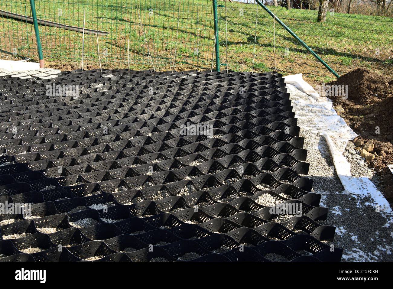 Ecological build of the car parking using crushed stone and plastic ...