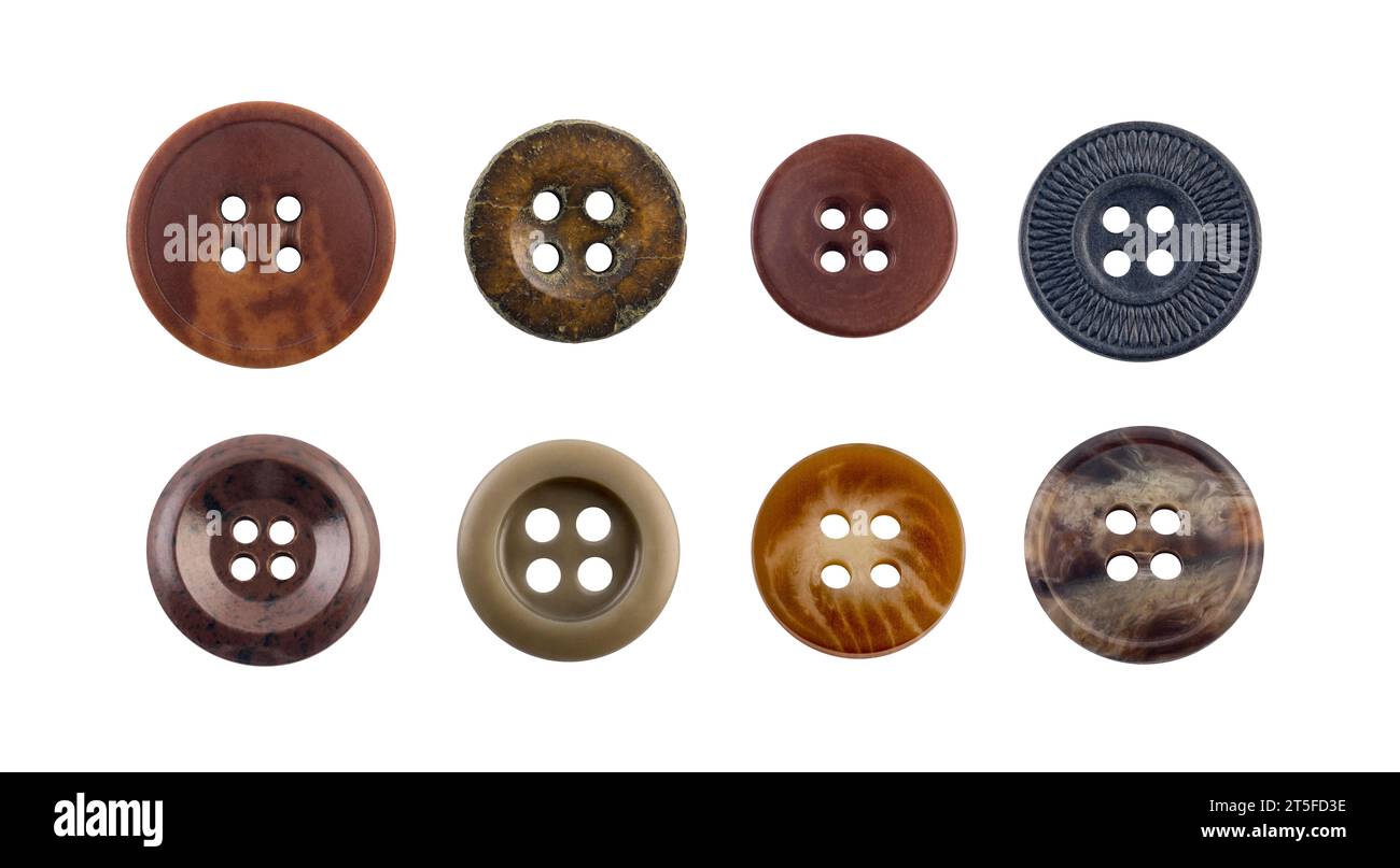 Group of various sewing clothing buttons isolated on white background ...