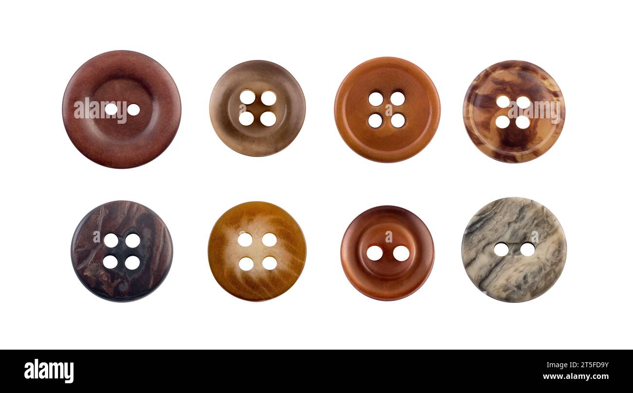 Group of various sewing clothing buttons isolated on white background ...