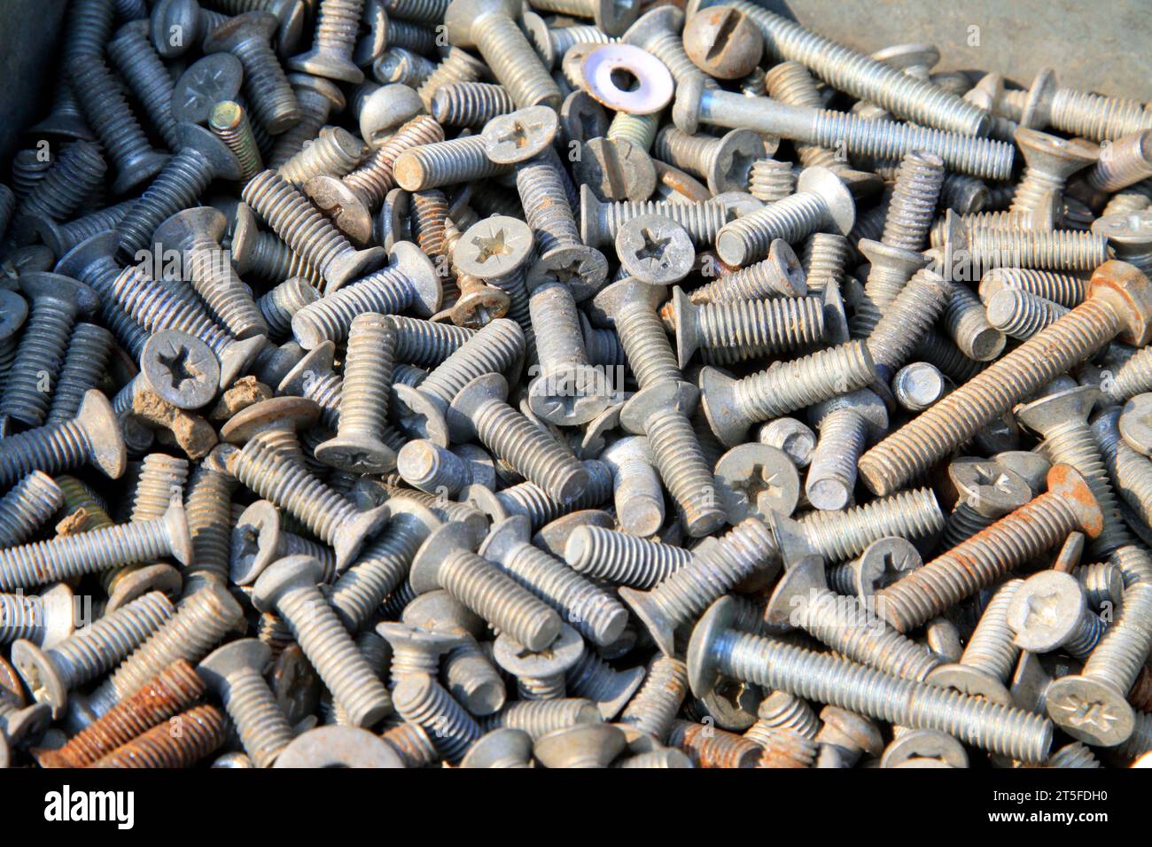 new bolts stacked together in a shop Stock Photo - Alamy