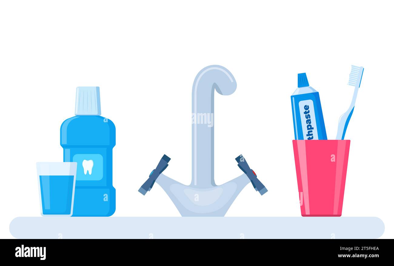 Bathroom sink with toothpaste and toothbrush, mouthwash, glass of water ...