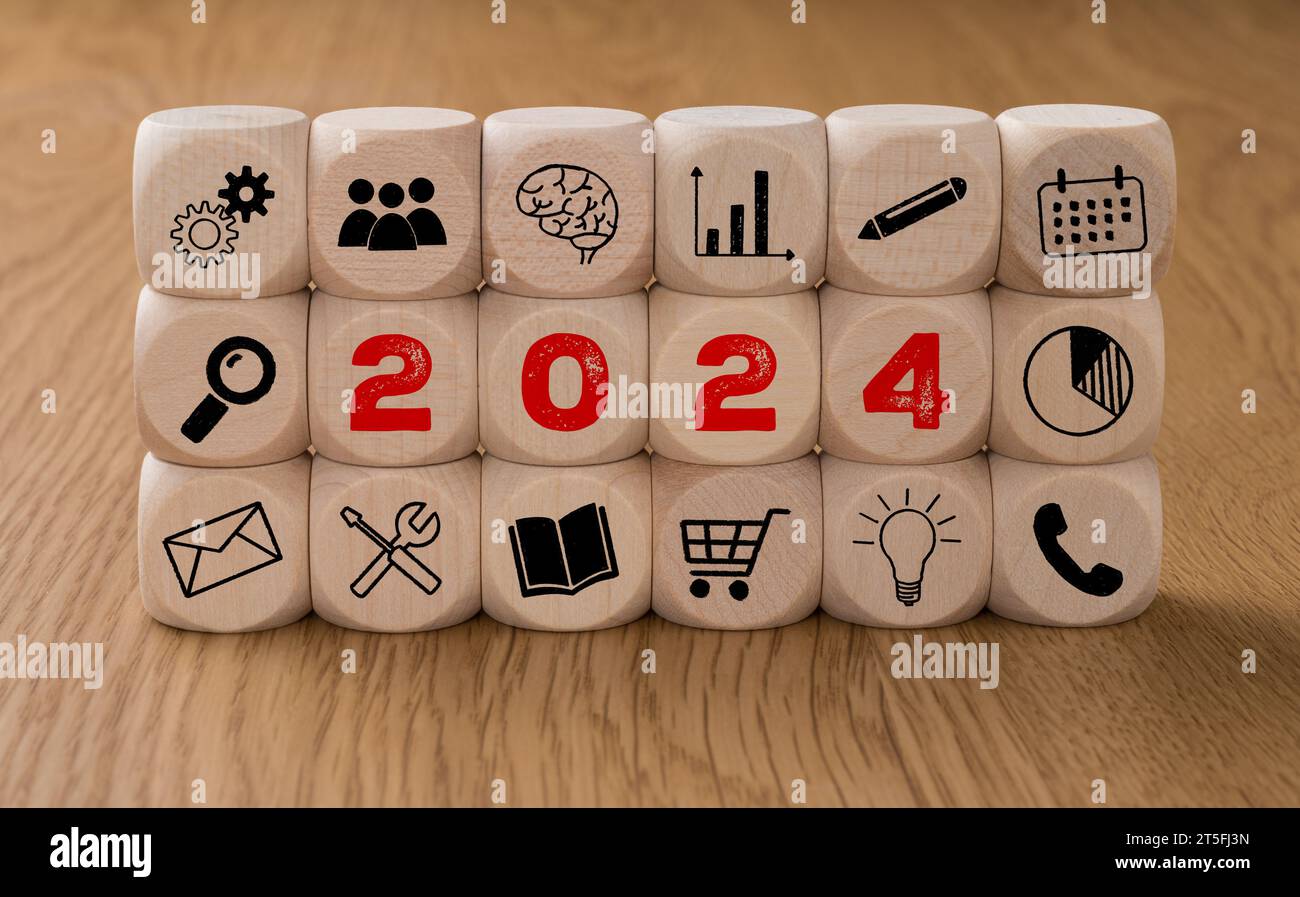 Dice with icons and the Year 2024 Stock Photo - Alamy