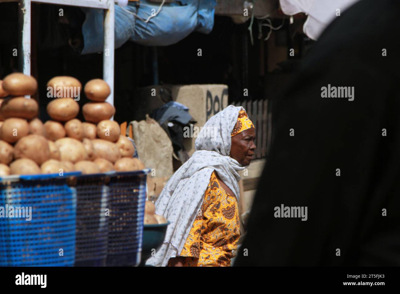 a day at market in Kano state Nigeria, showing how people are passing ...