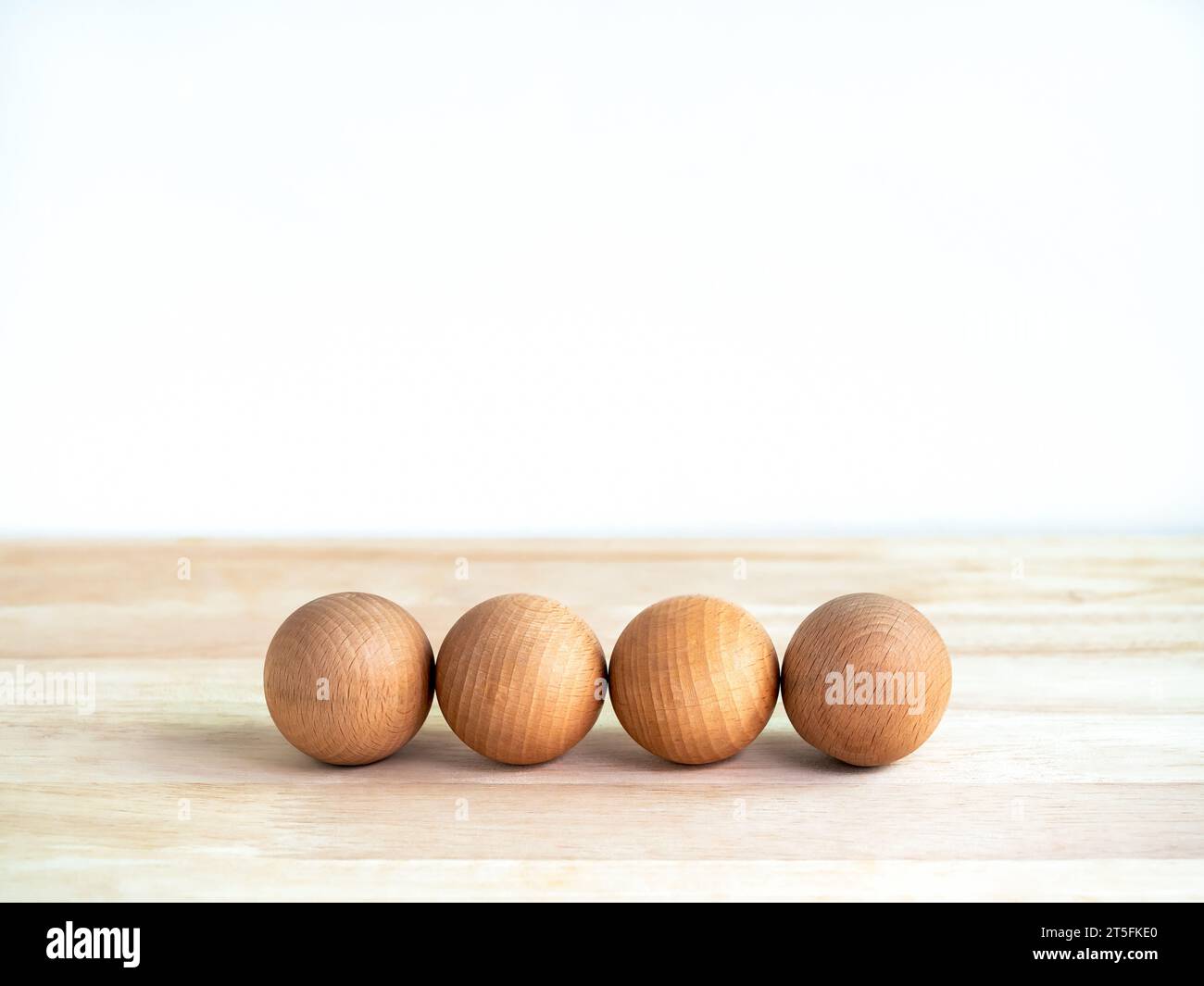 Empty four blank wooden spheres for your text or icon design isolated ...