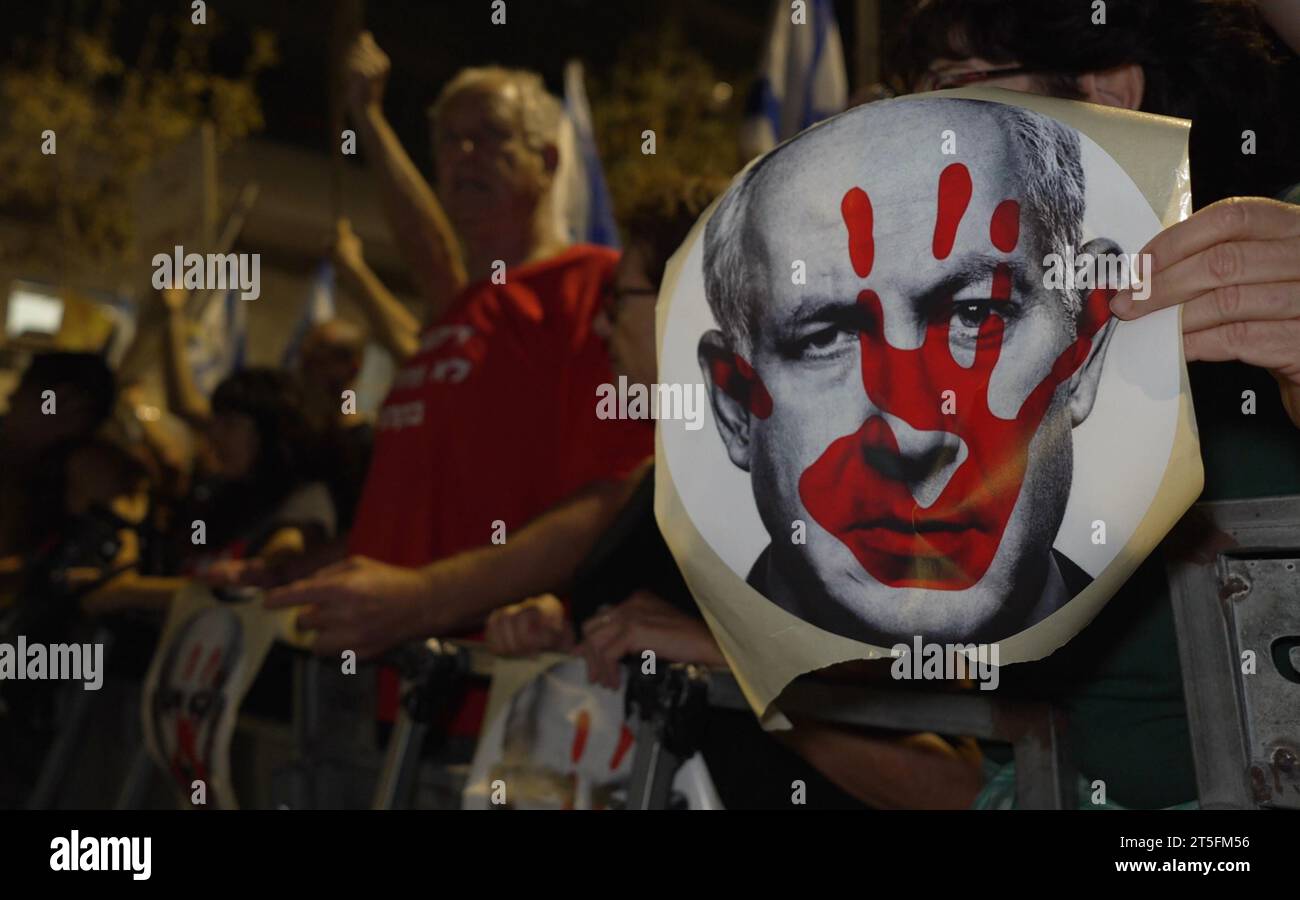 Protesters gather near Prime Minister Benjamin Netanyahu's private home ...
