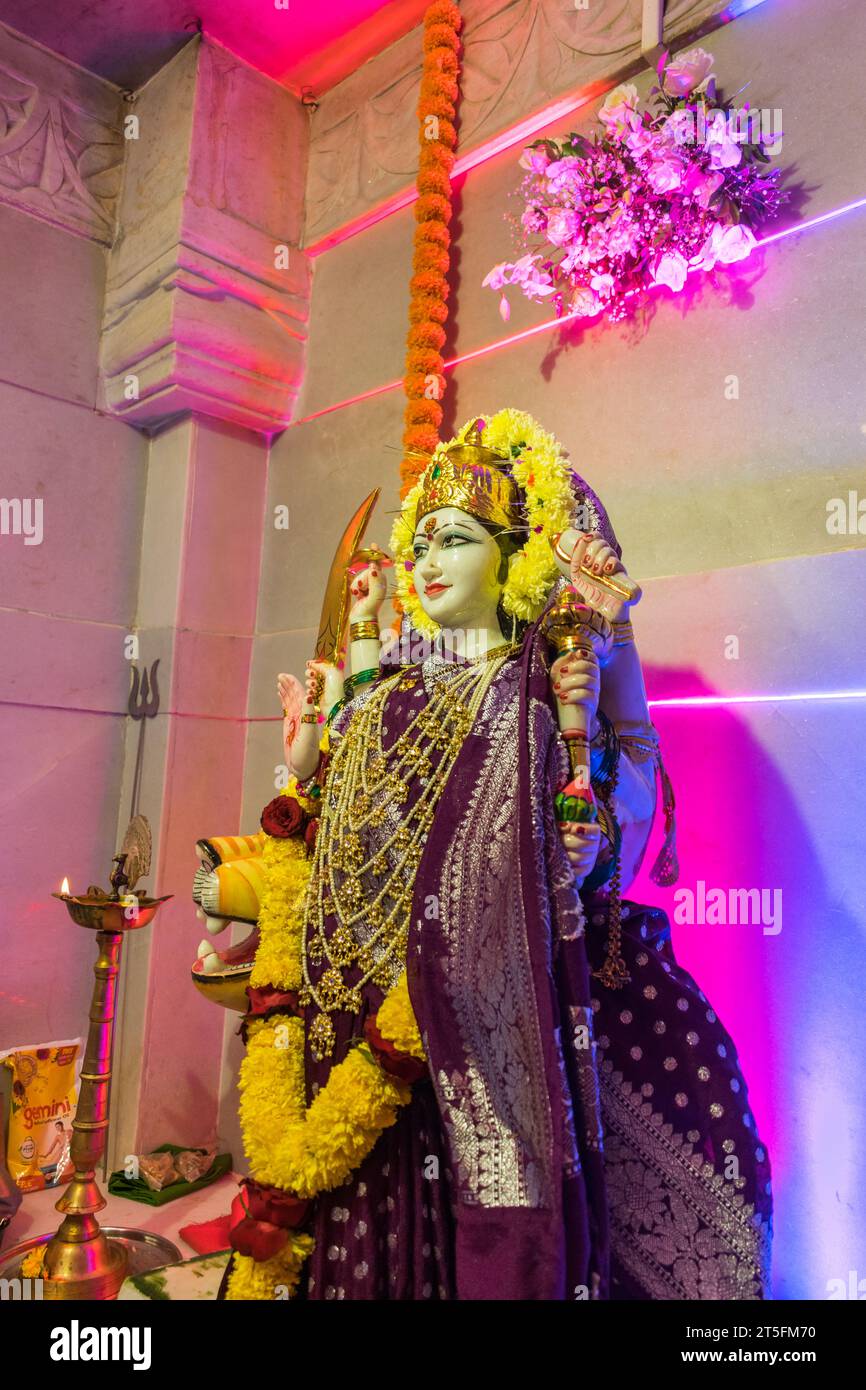 A beautiful idol of Maa Durga being worshipped at a pandal during ...