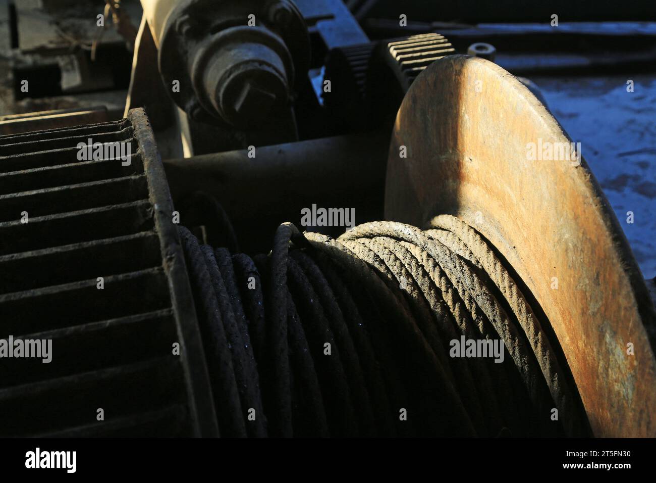 waste of wire rope and the light in a factory Stock Photo - Alamy