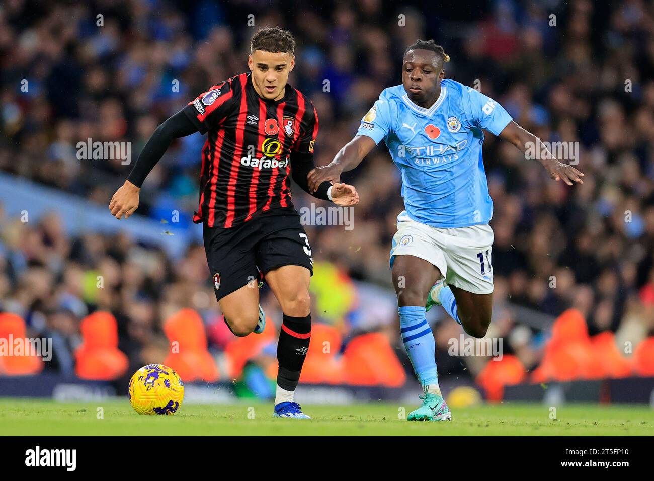 Jeremy Doku 11 Of Manchester City Tries To Catch Max Aarons 37 Of
