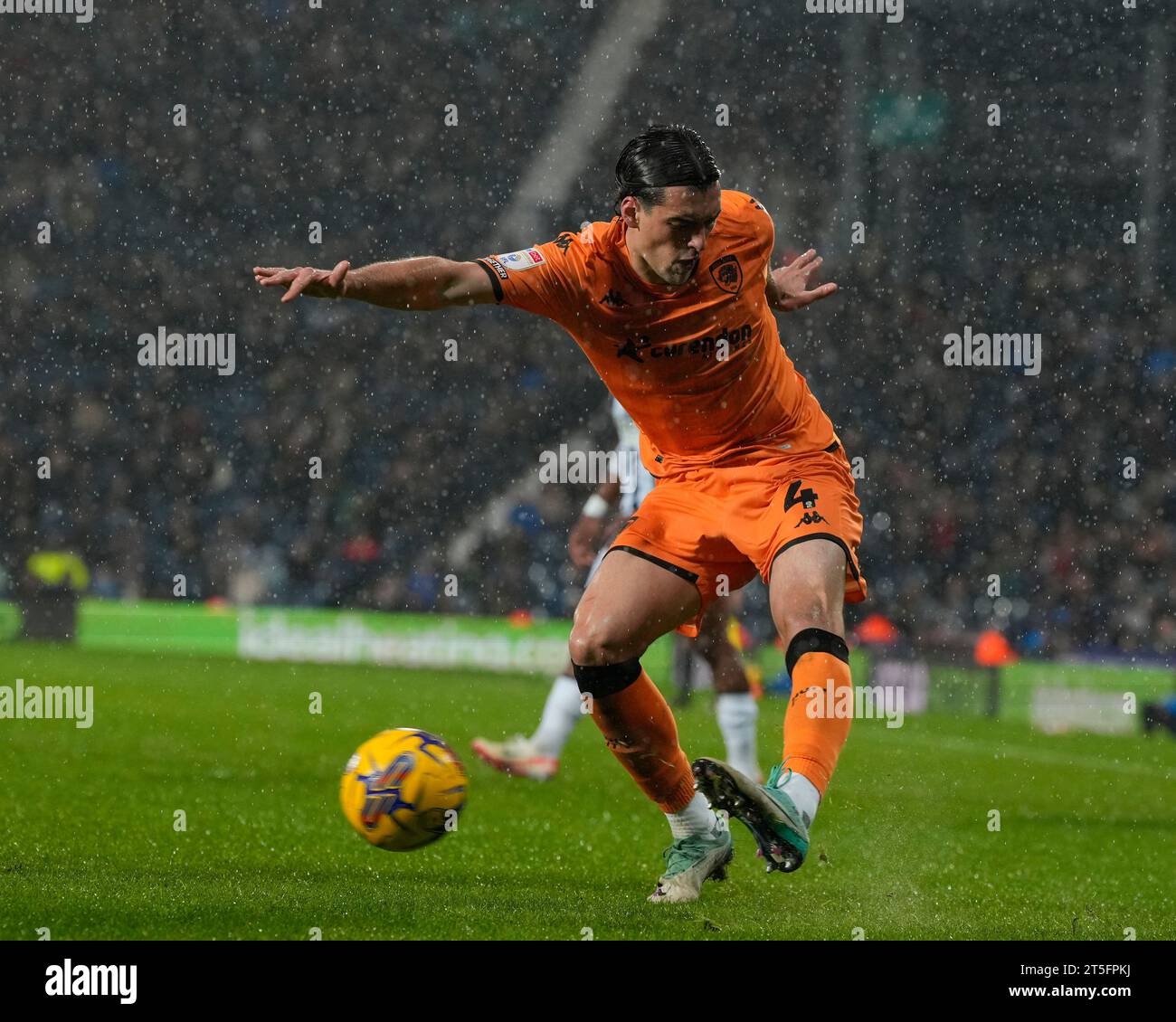 Jacob Greaves #4 of Hull City crosses the ball during the Sky Bet ...