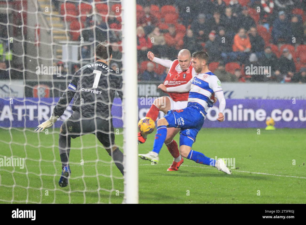 Georgie Kelly #12 of Rotherham United scores to make it 1-1 during the ...