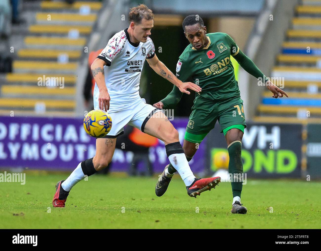 Mickel Miller #14 of Plymouth Argyle clears the ball during the Sky Bet ...