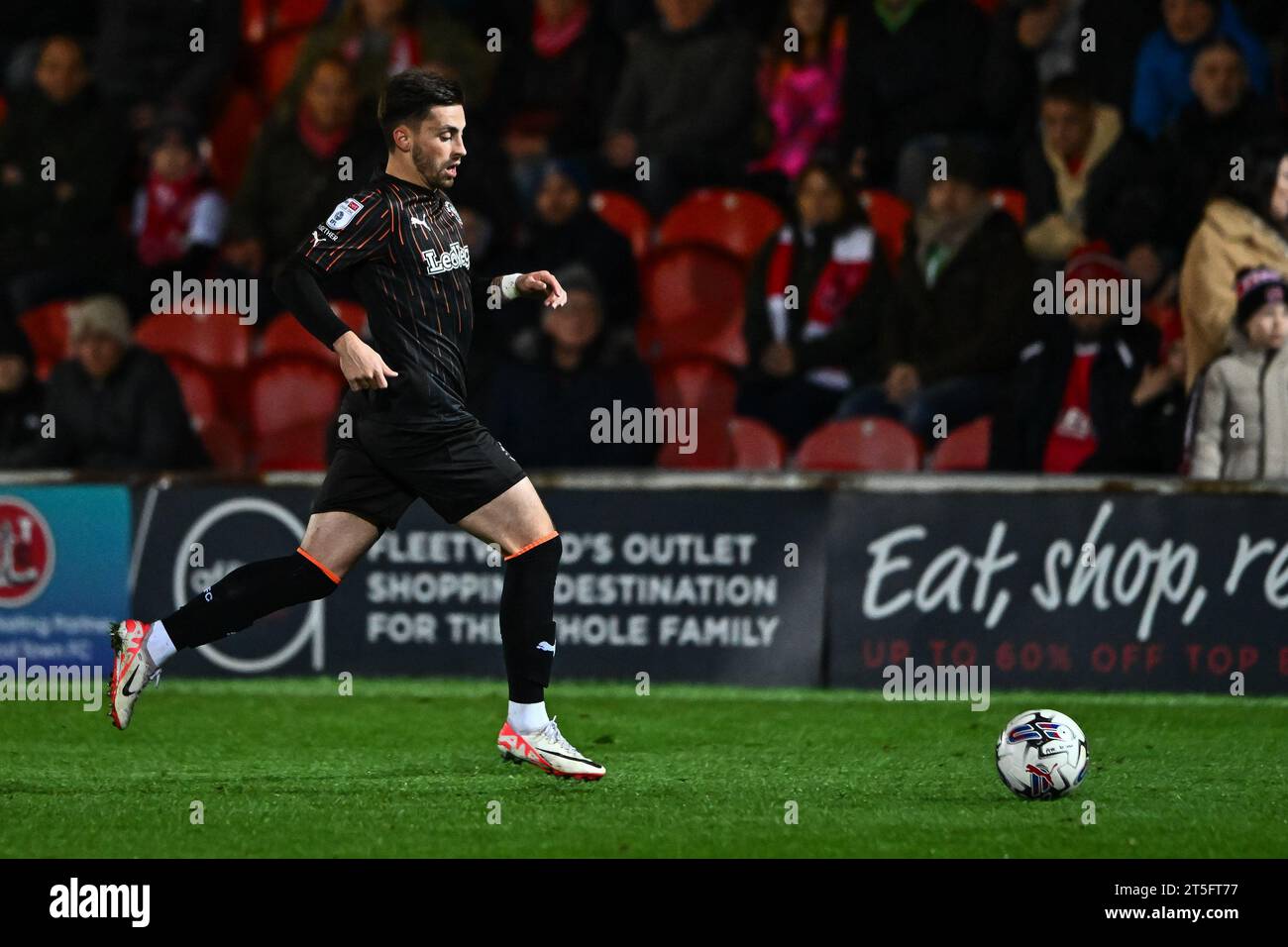 Owen Dale #7 of Blackpool makes a break with the ball during the Sky ...